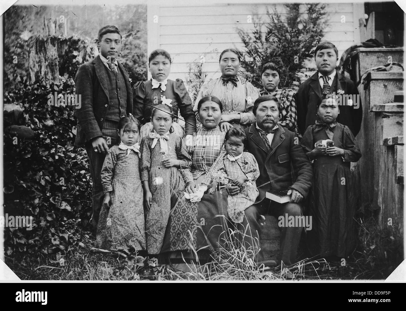 This photograph shows a family from an Indigenous community. The image ...