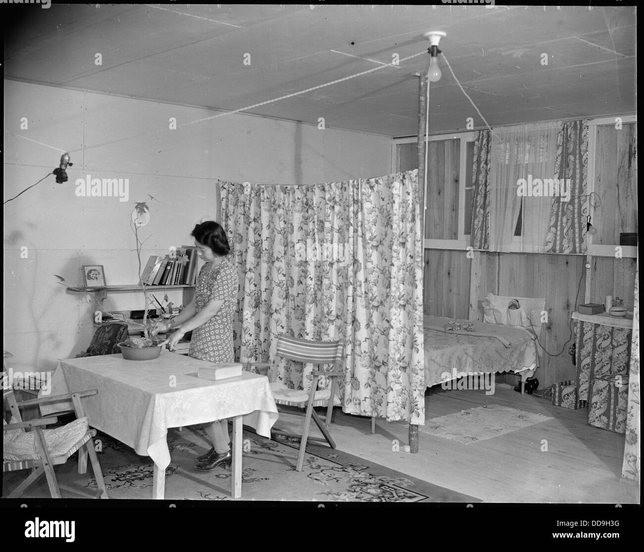 This photograph depicts the interior of a typical barracks at the ...