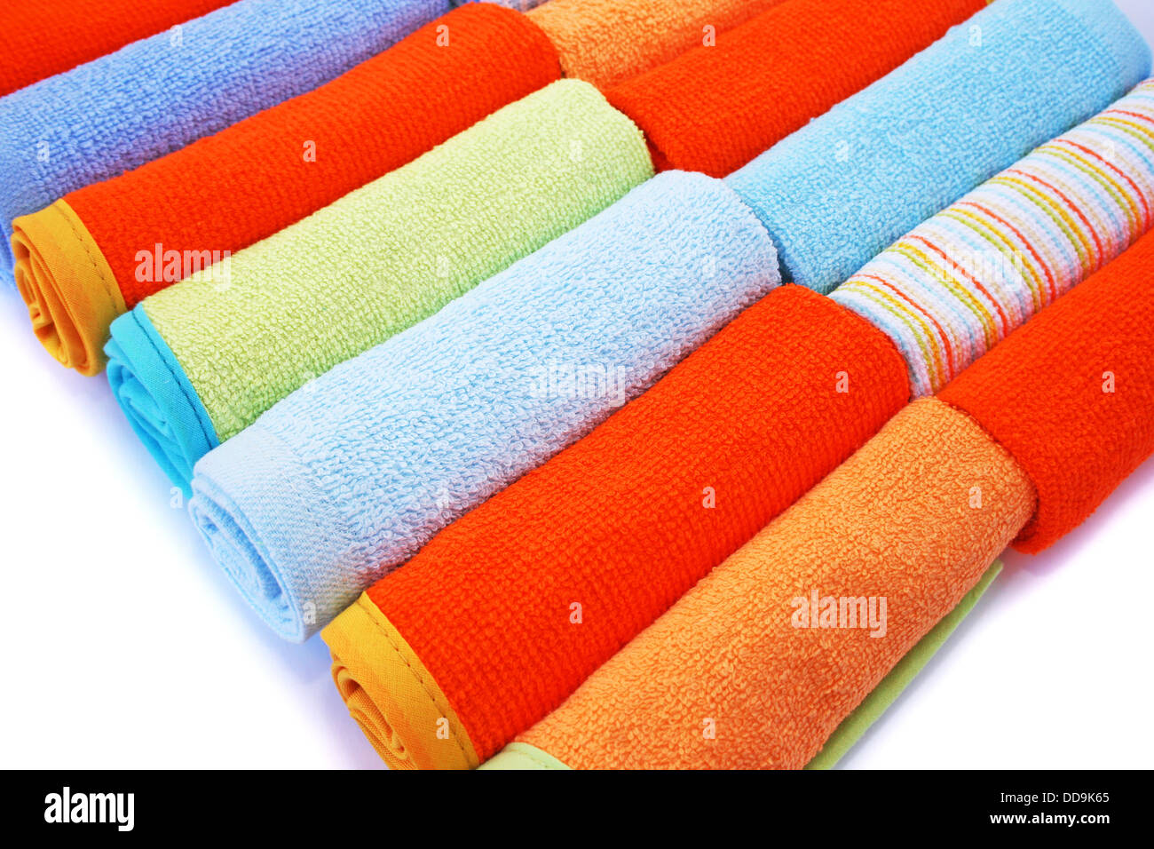 Colorful towels on white background Stock Photo - Alamy