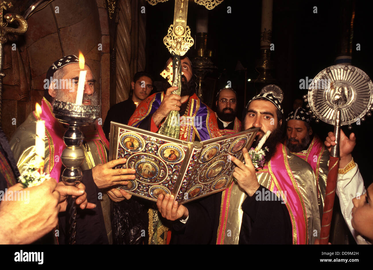 Syrian Orthodox priests taking part in the ceremony of the Holy Fire at ...