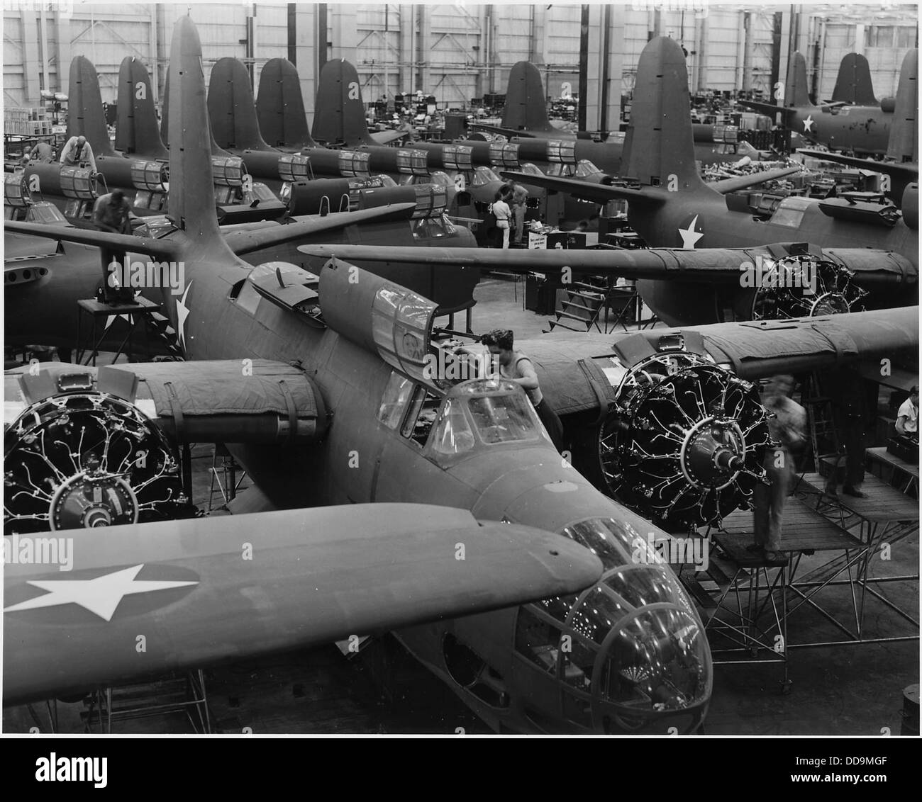 A production line at the Douglas Aircraft plant in Long Beach shows A ...