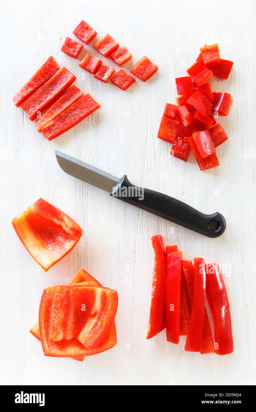 Variety of sliced red bell peppers, close up Stock Photo - Alamy