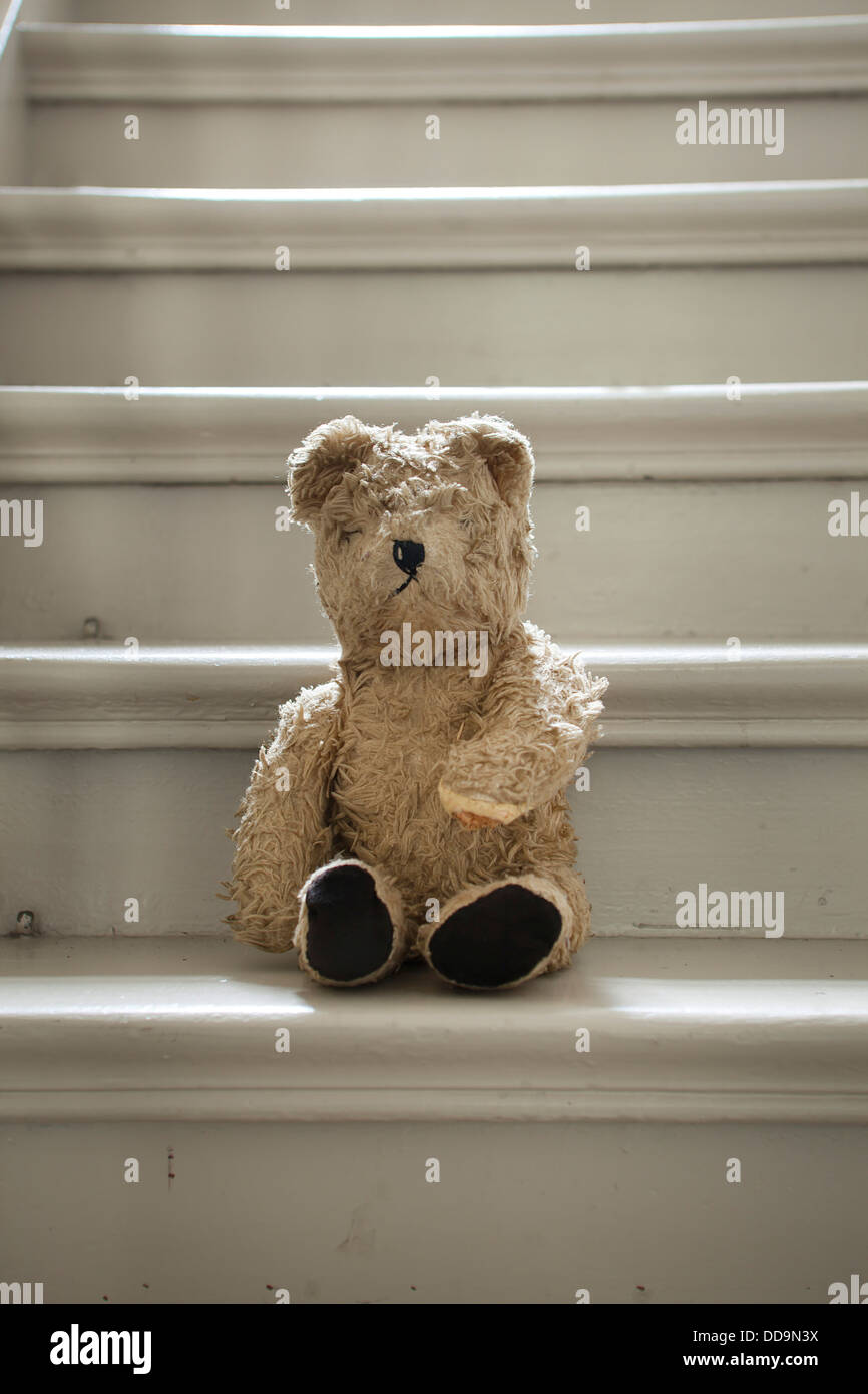 Teddybear on steps Stock Photo - Alamy