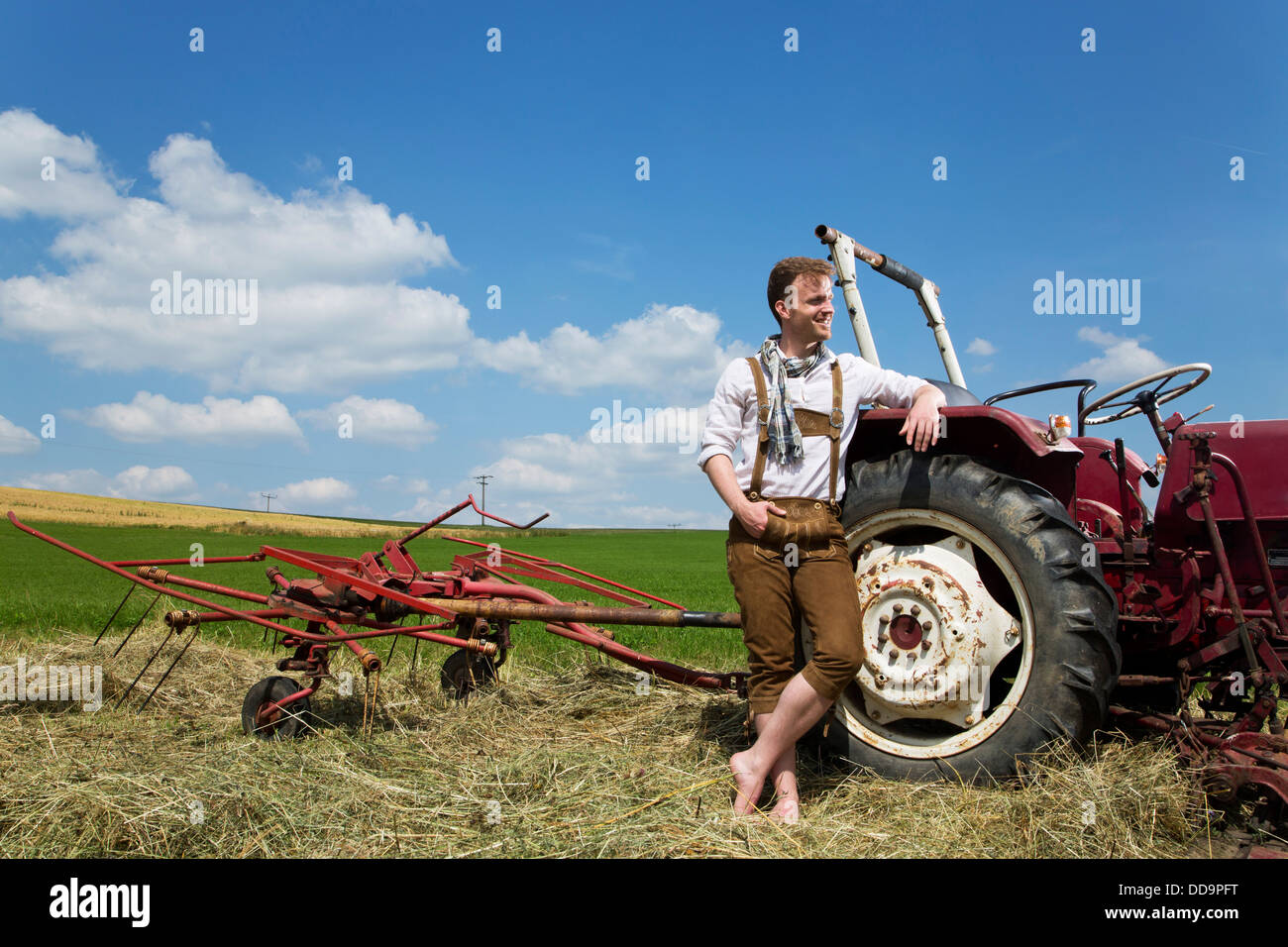 Germany, Bavaria, Farmer looking away, smiling Stock Photo - Alamy