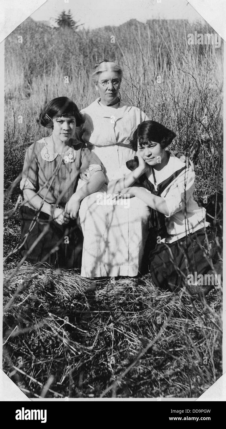 This image depicts Mrs. Minthorn with two Native American girls ...