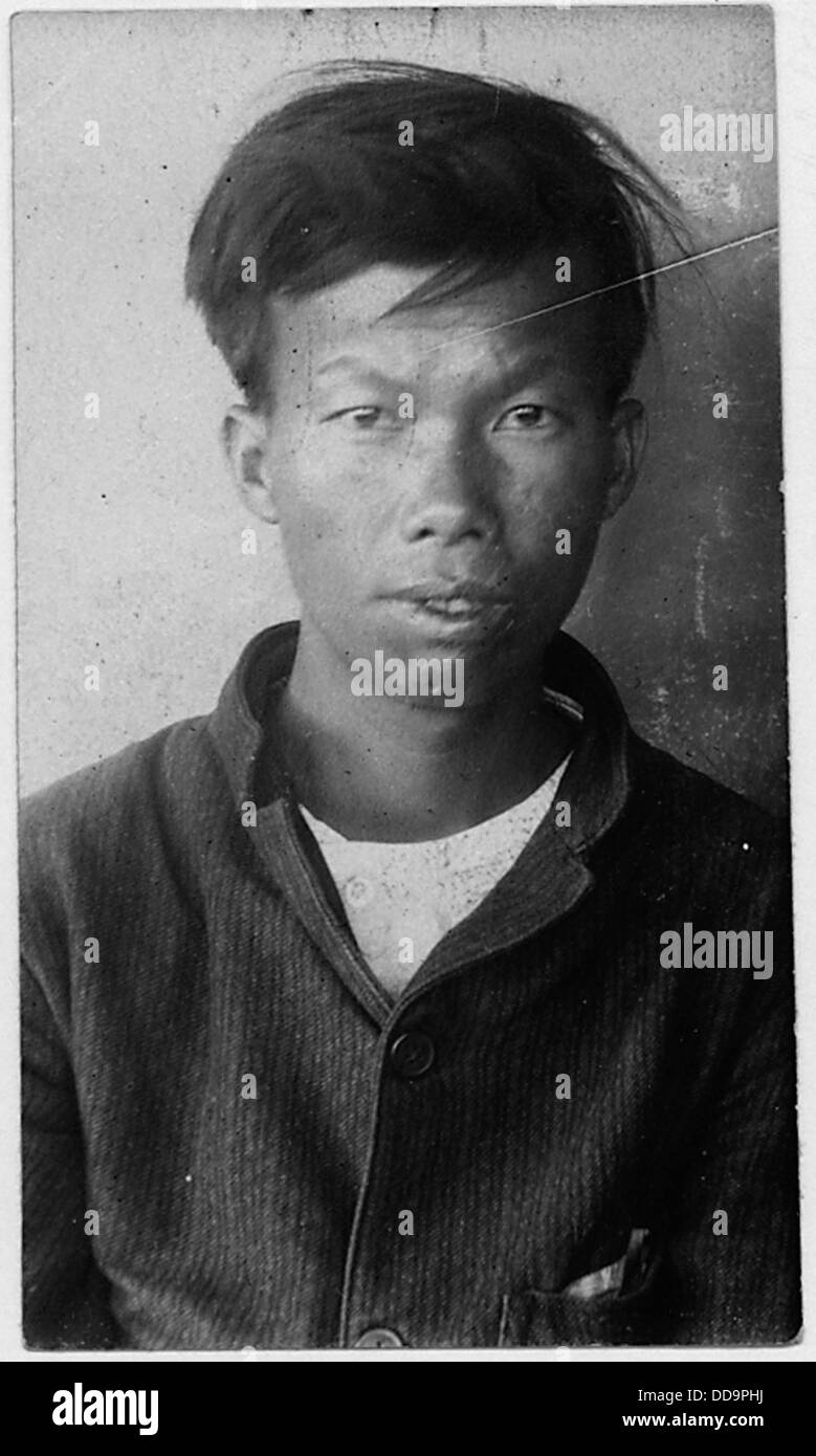A mugshot of Ah Fong, a historical criminal figure, captured as part of ...