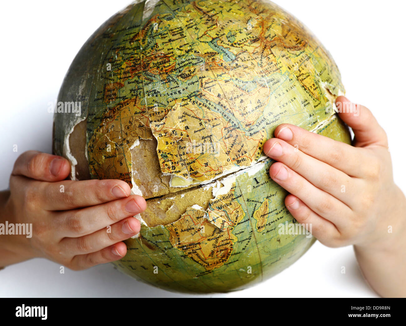 Two hands holding a broken globe, illustration for a damaged planet ...