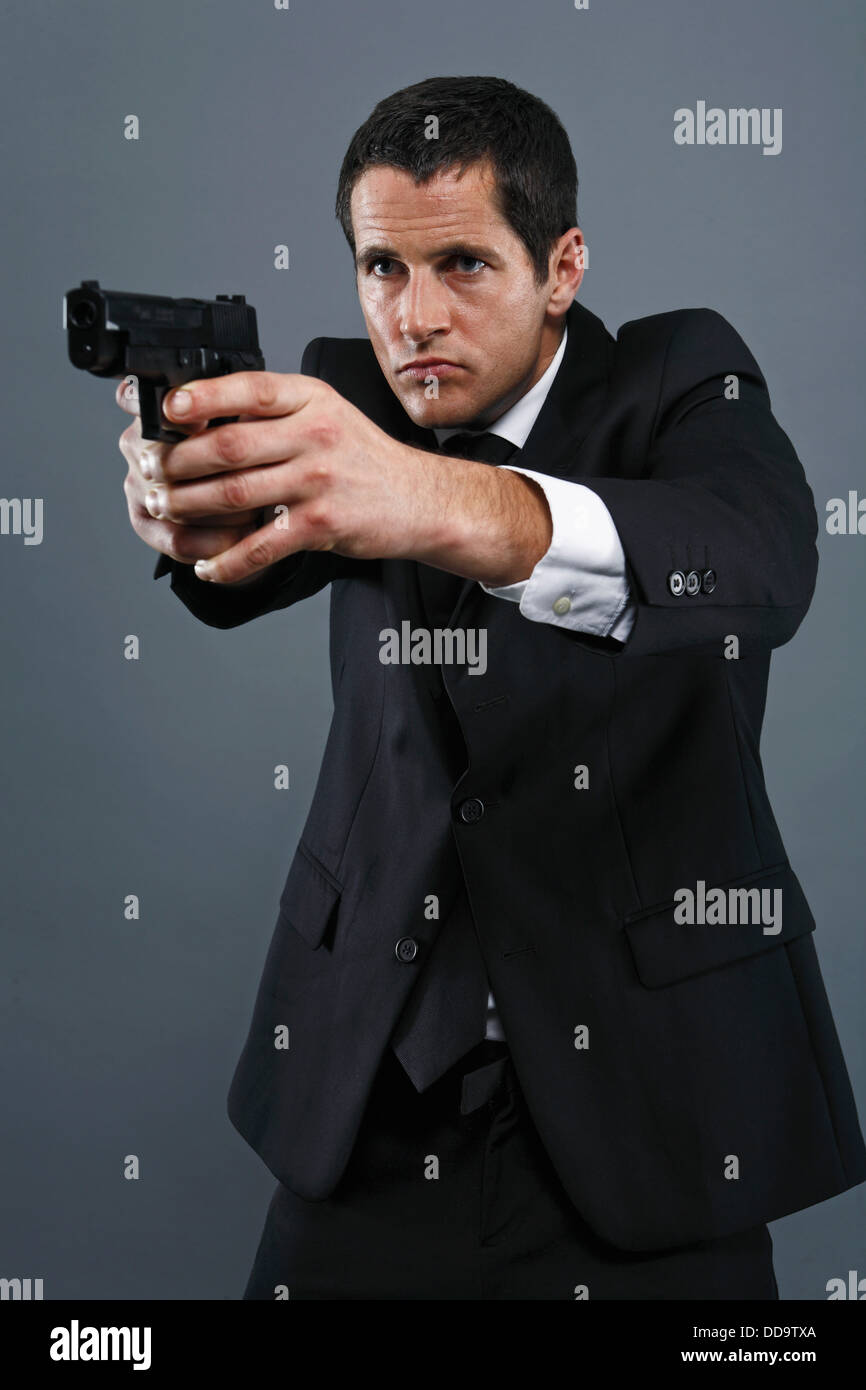 Aiming handgun hi-res stock photography and images - Alamy