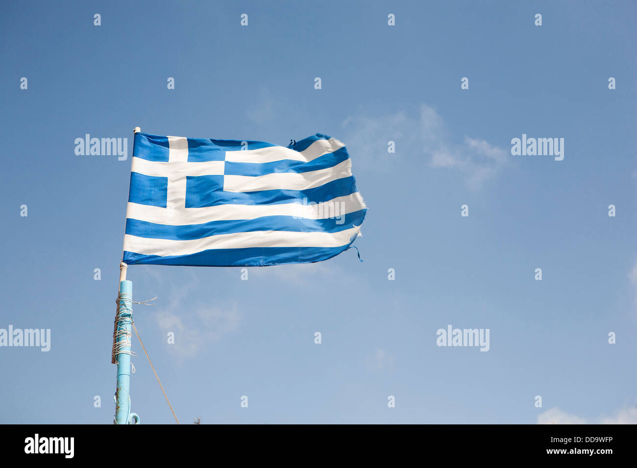 Greece, Mykonos, National flag against sky Stock Photo - Alamy