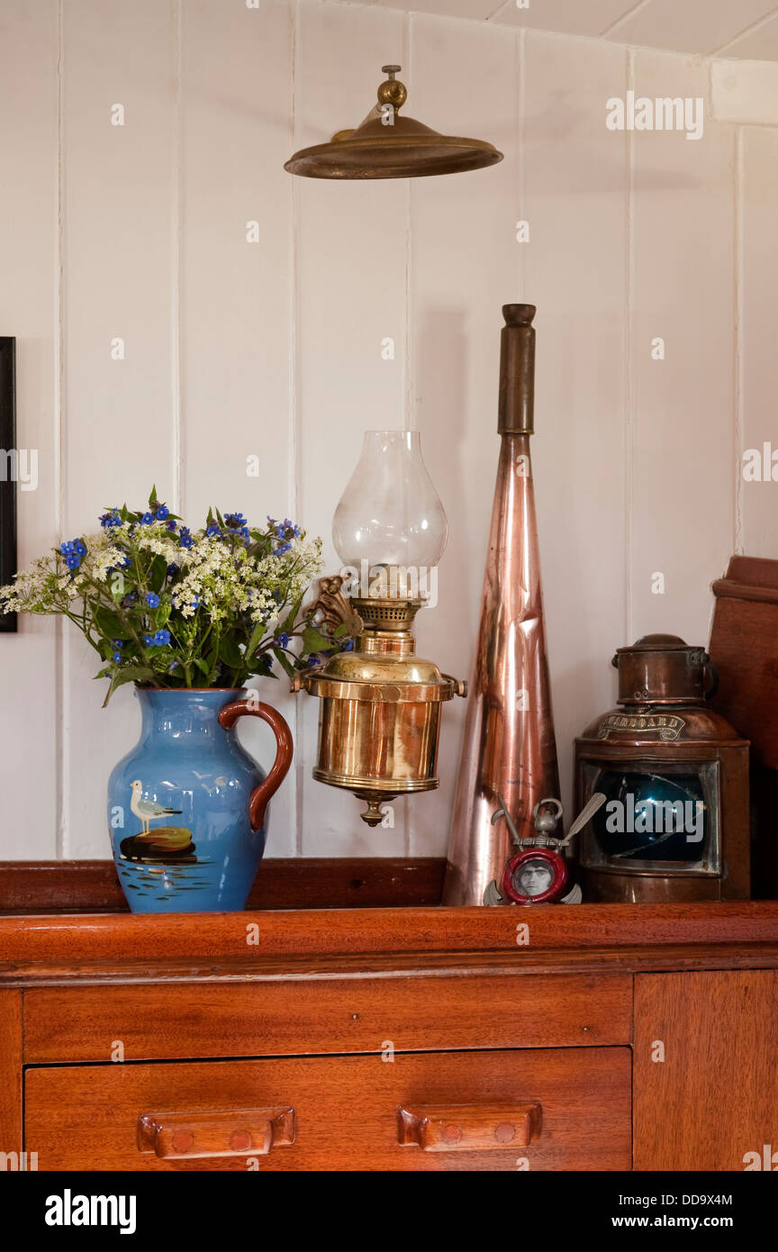 Nautical objects on shelf of boat interior Stock Photo - Alamy