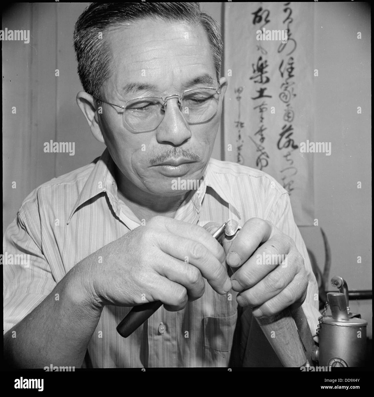 Poston, Arizona. Mr. Niseki shows how to make beautiful rings out of ...