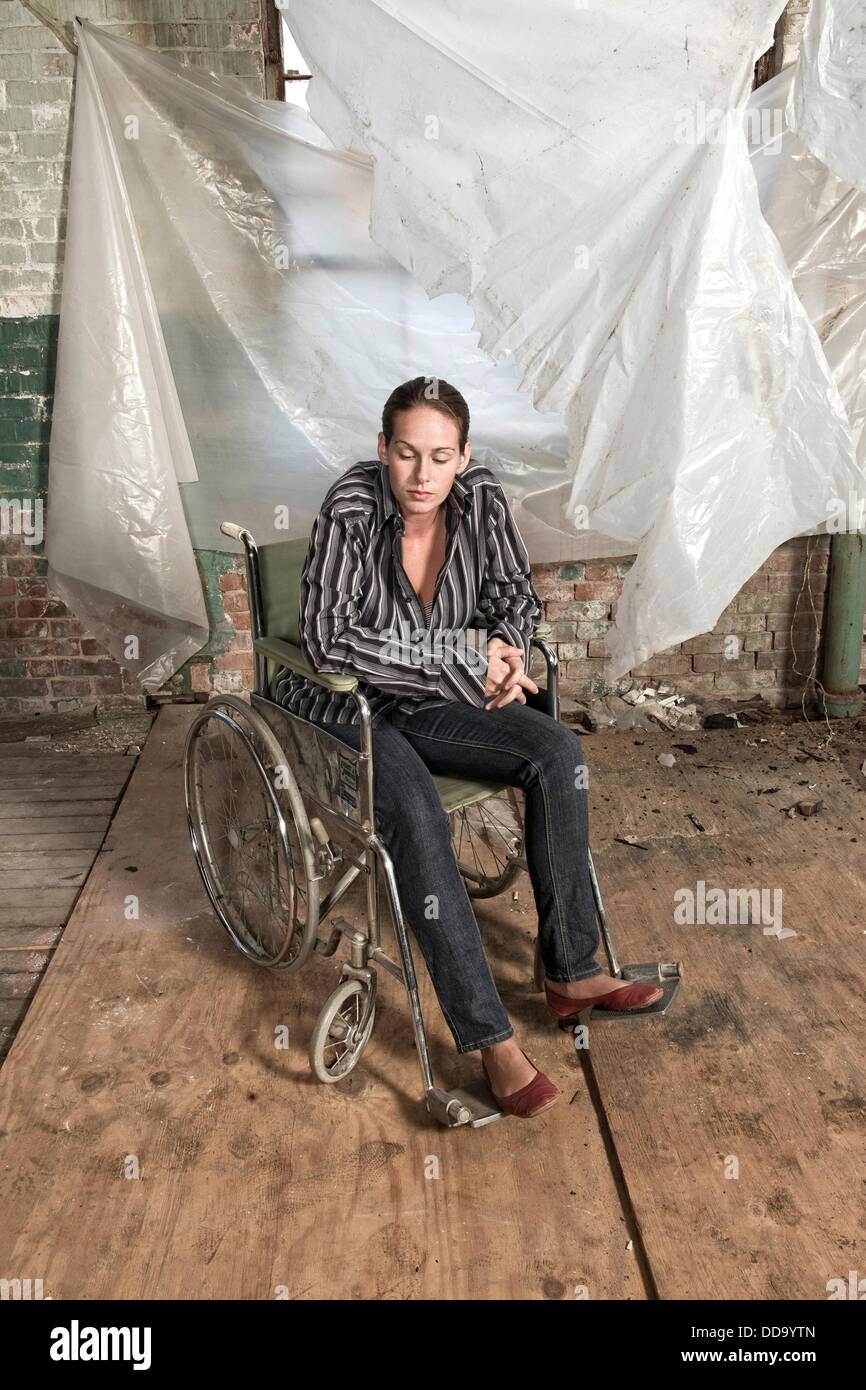 Old crippled woman in wheelchair hi-res stock photography and images ...