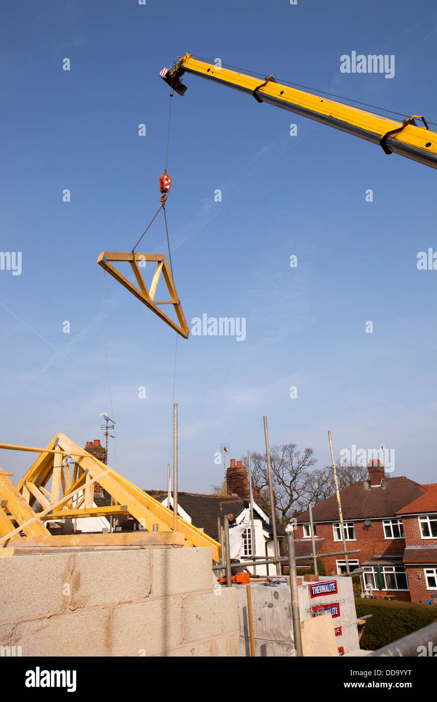 Roof truss lifting hi-res stock photography and images - Alamy