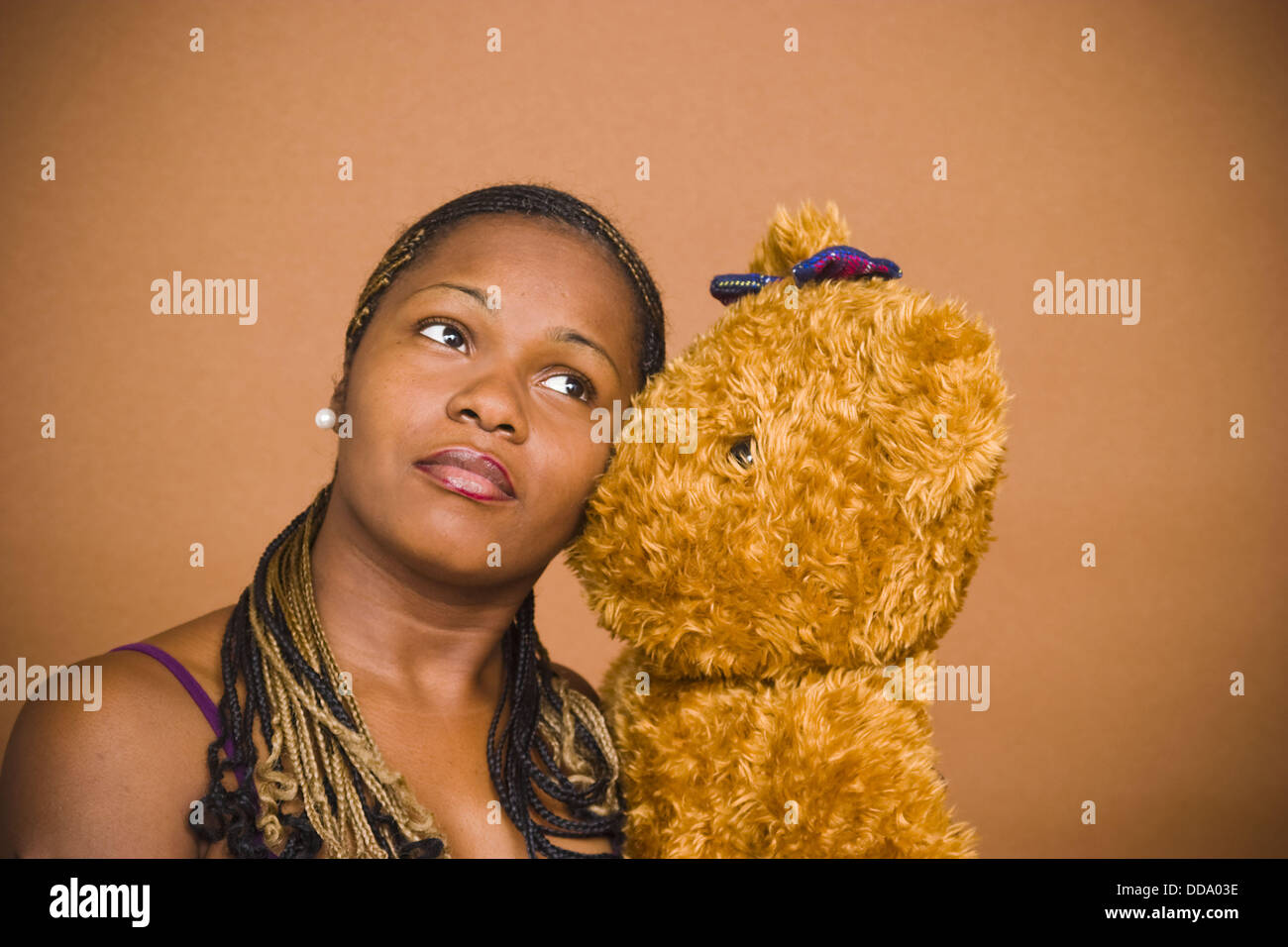 Embracing friend serious woman hi-res stock photography and images - Alamy