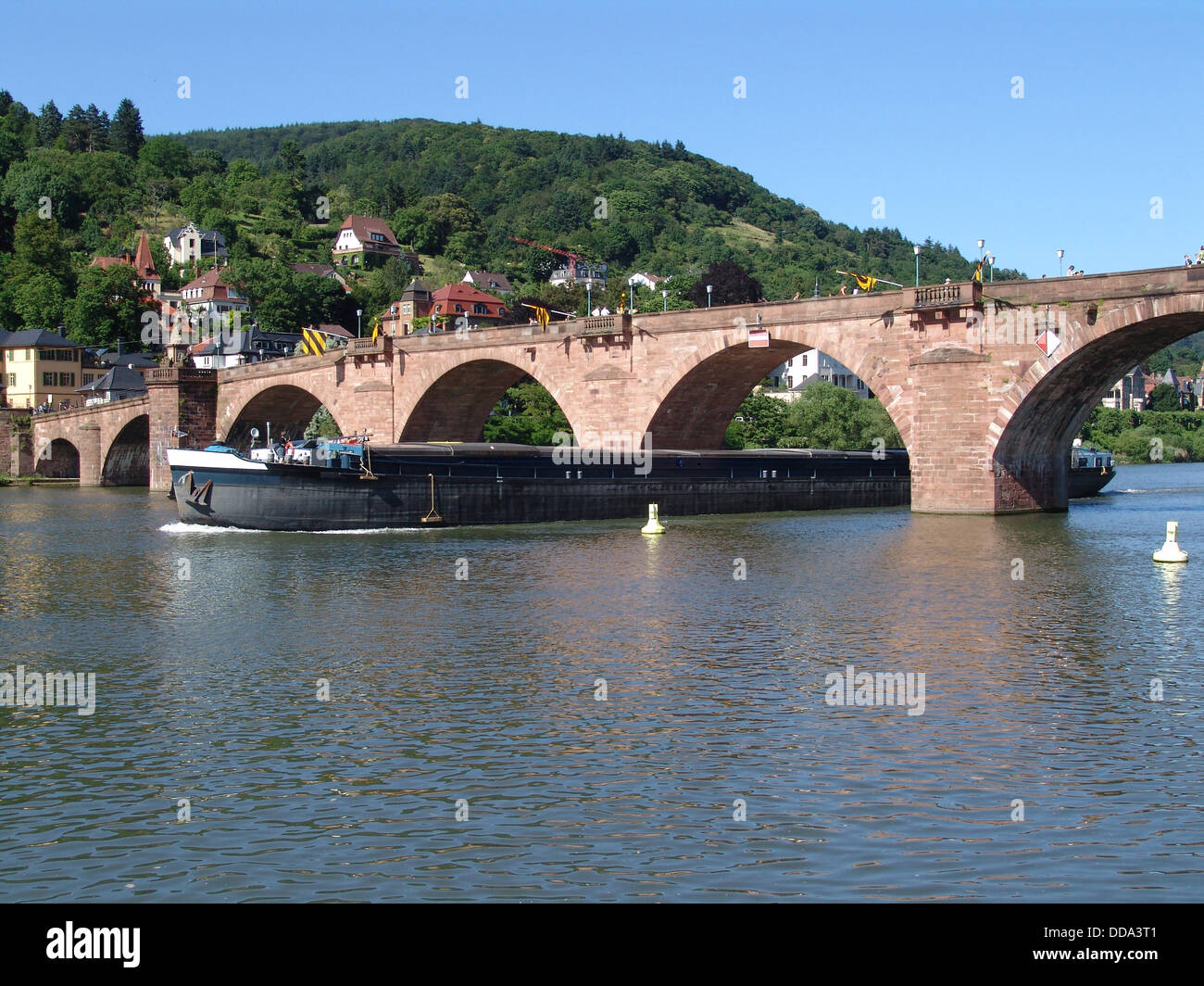 Ship on river Neckar in Heidelberg, passing Karl-Theodor bridge Stock ...