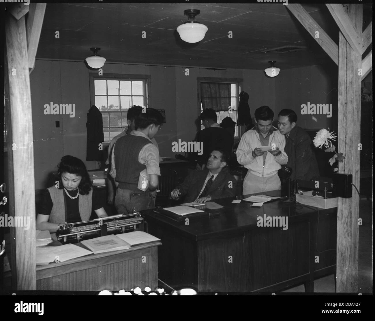 A section of the office staff is shown at the Rohwer Relocation Center ...