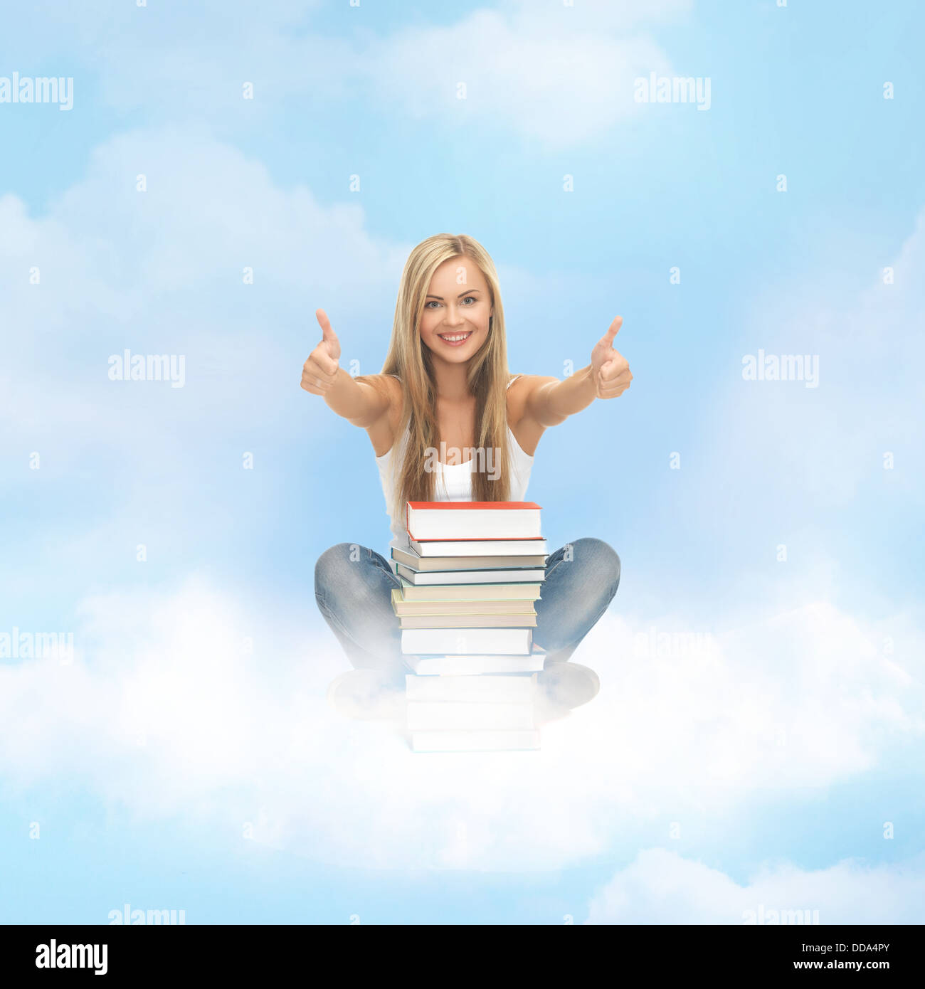 student with stack of books Stock Photo - Alamy