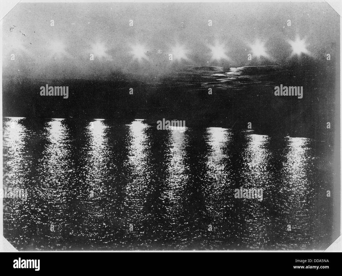 A photograph depicting the sun over the Arctic Circle, showcasing the ...