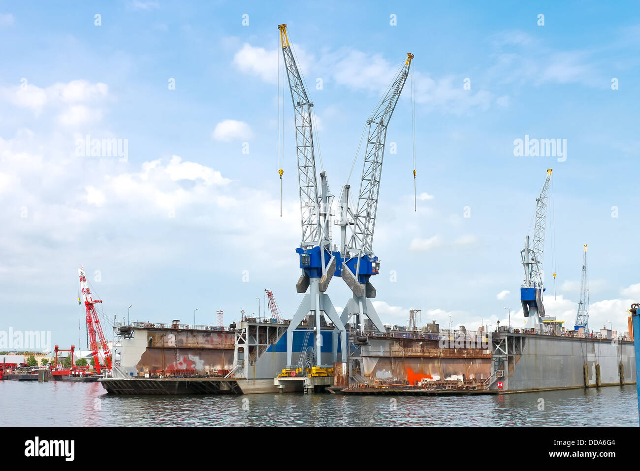 Industrial landscape. Dry docks and cranes in shipyard Stock Photo - Alamy