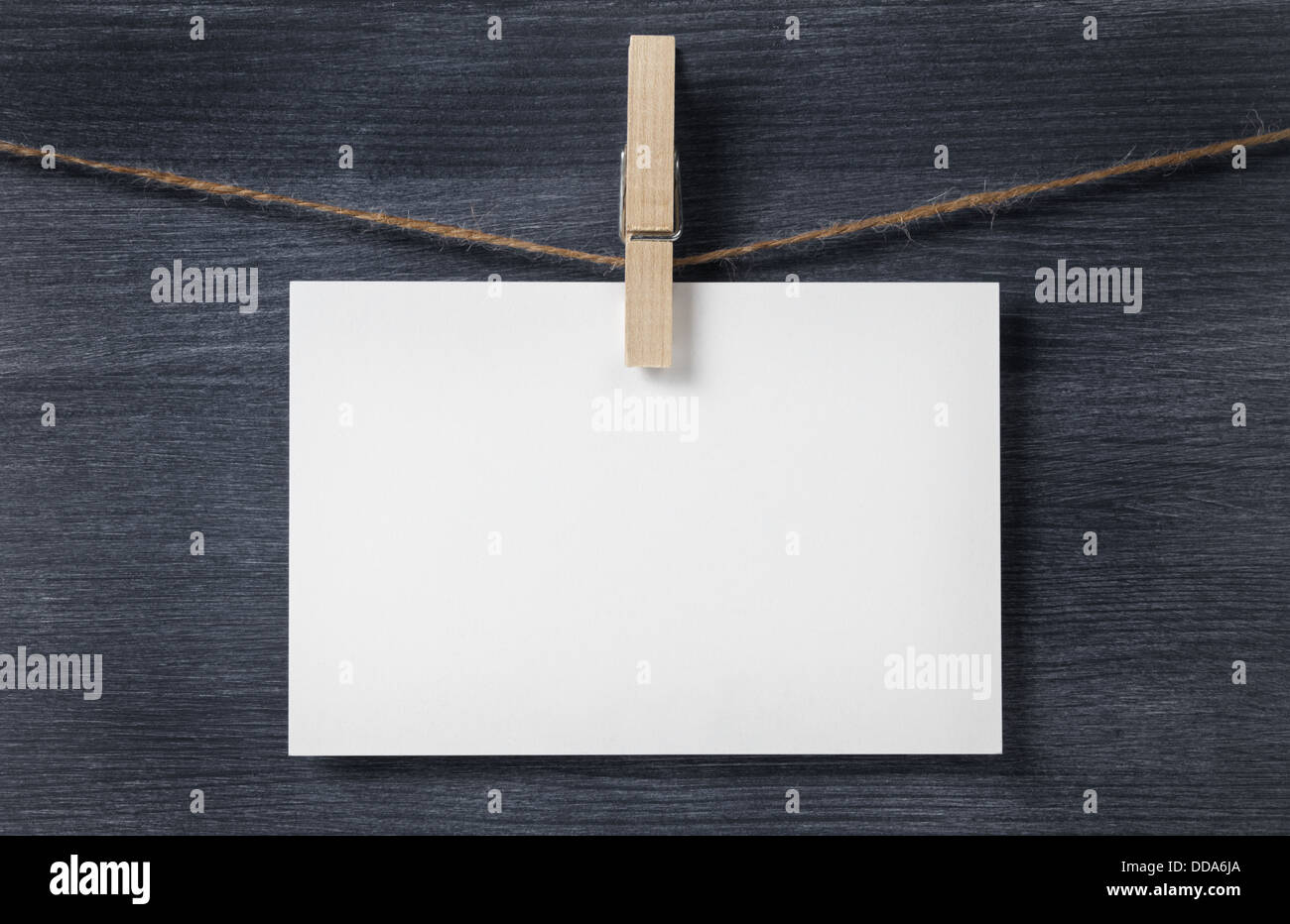 paper card hanging on the rope, blank Stock Photo - Alamy