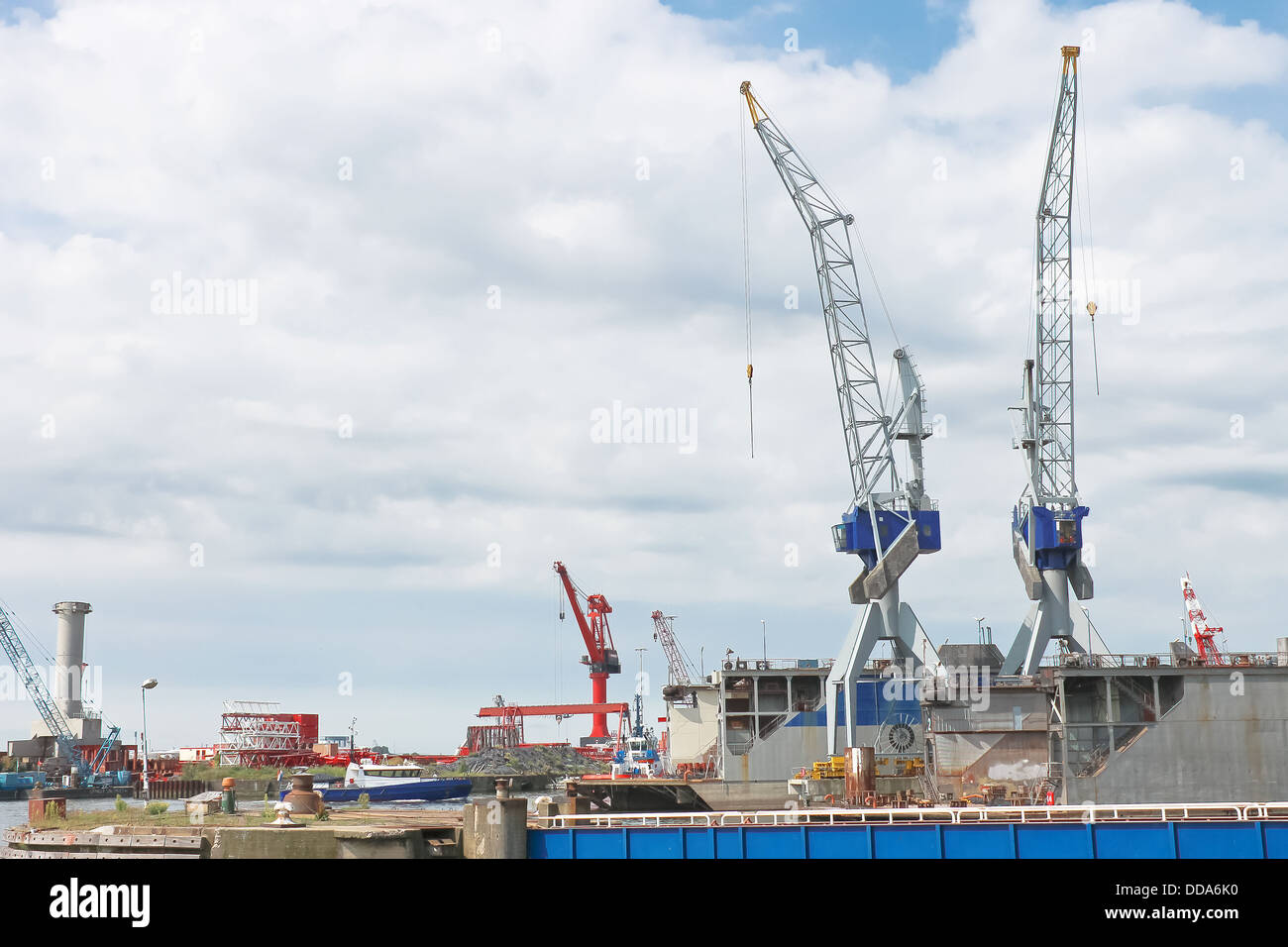 Industrial landscape. Dry docks and cranes in shipyard Stock Photo - Alamy
