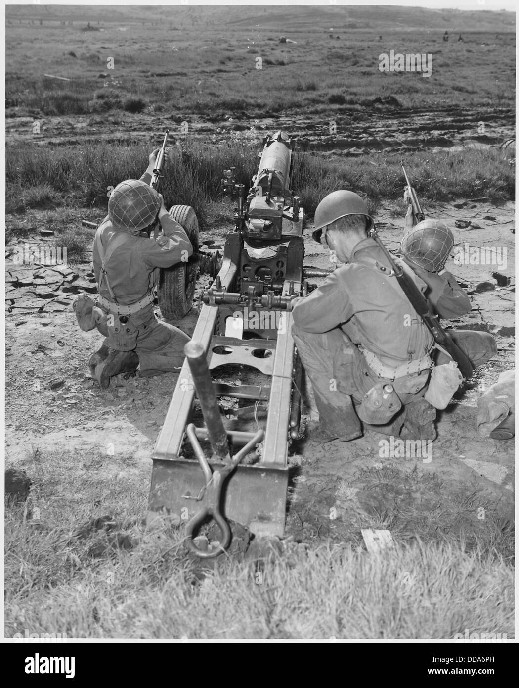 A military training camp in action during maneuvers. Soldiers engage in ...