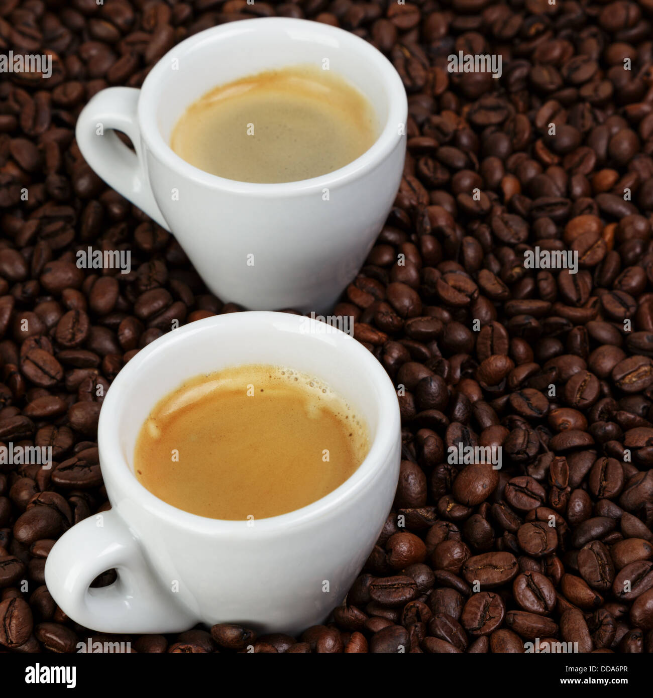 fine espresso in cup on coffee beans, coffee theme Stock Photo - Alamy