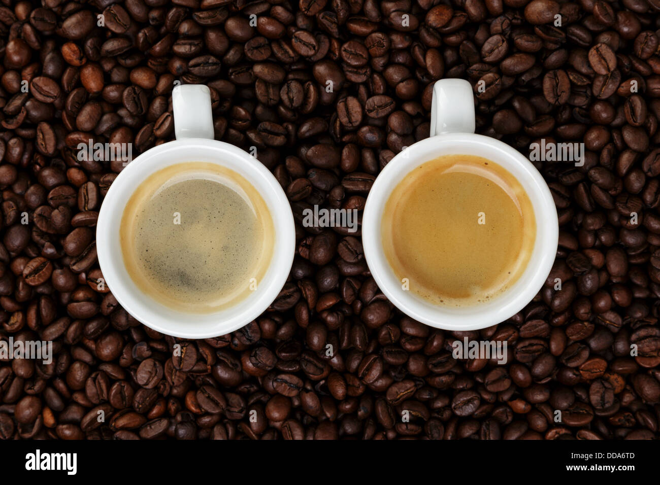 fine espresso in cup on coffee beans, coffee theme Stock Photo - Alamy