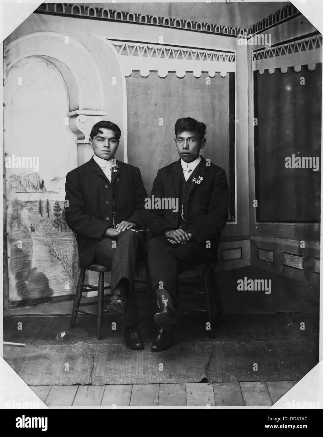 This photograph features two young Indian men, with their identities ...
