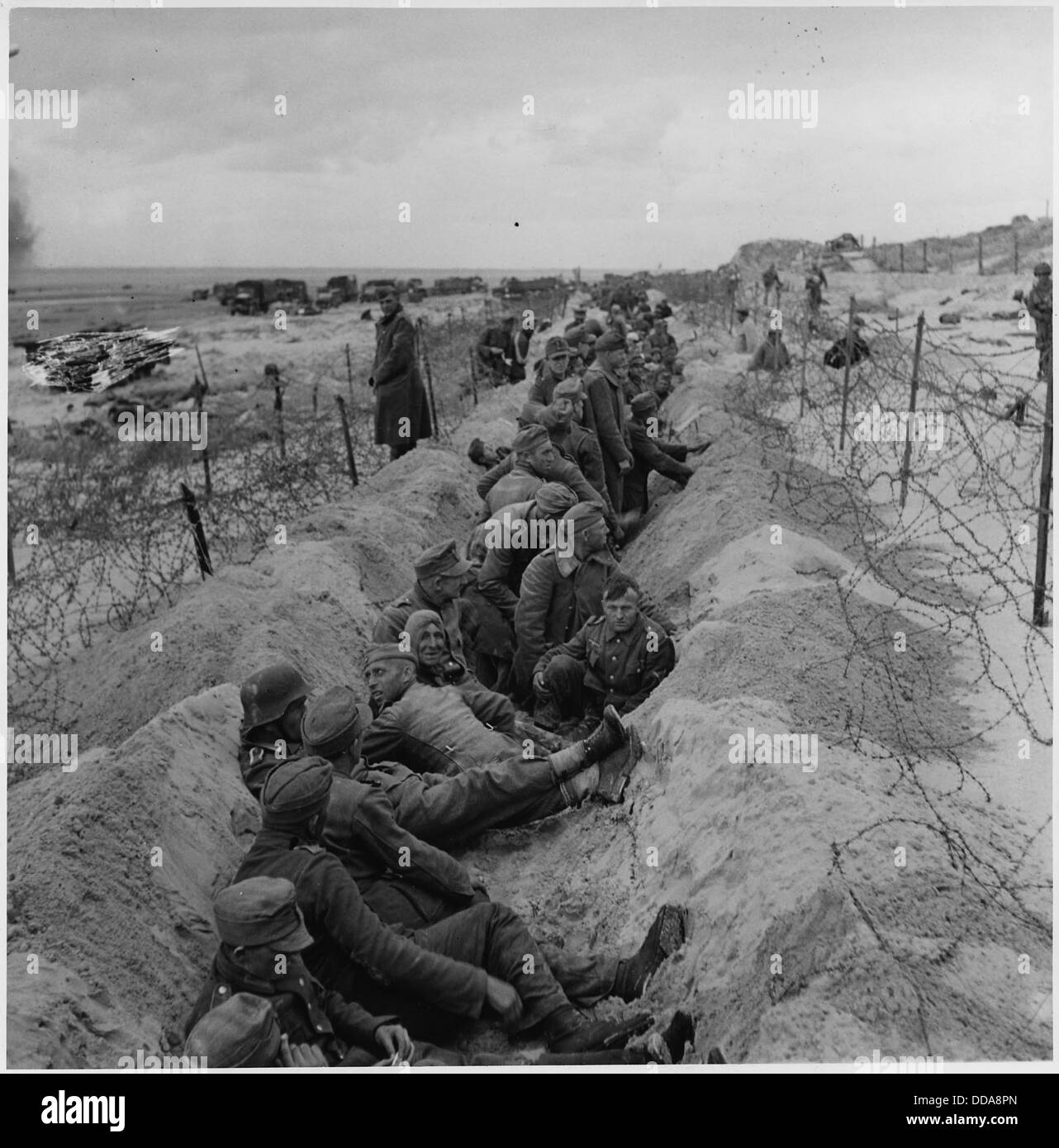 This image depicts German prisoners of war (POWs) in France during ...