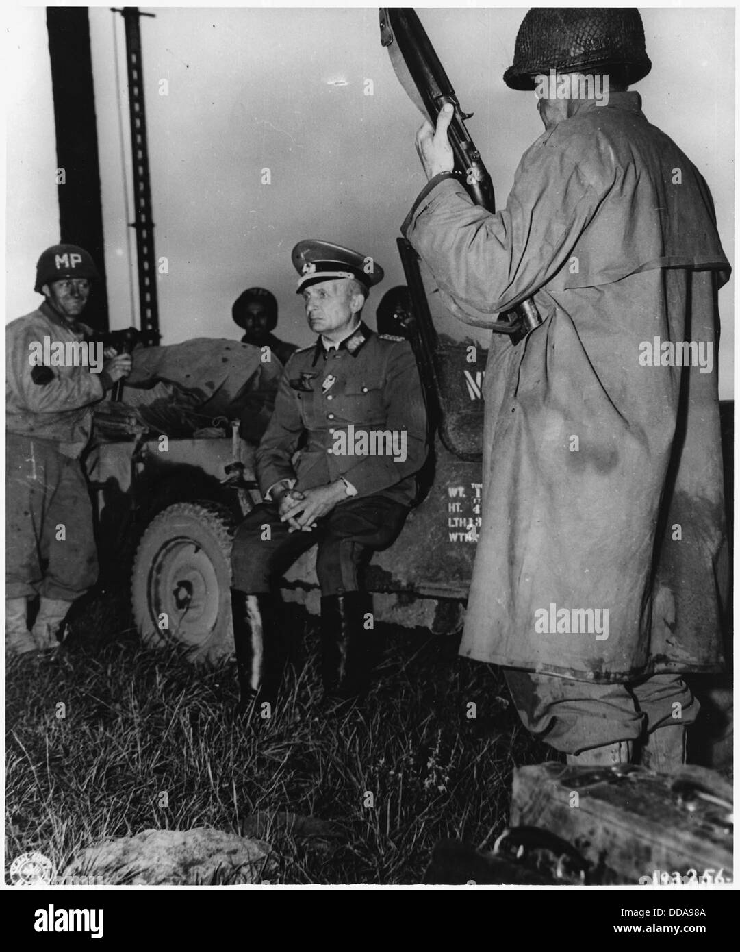 The image shows German prisoners of war (POWs) captured in France ...