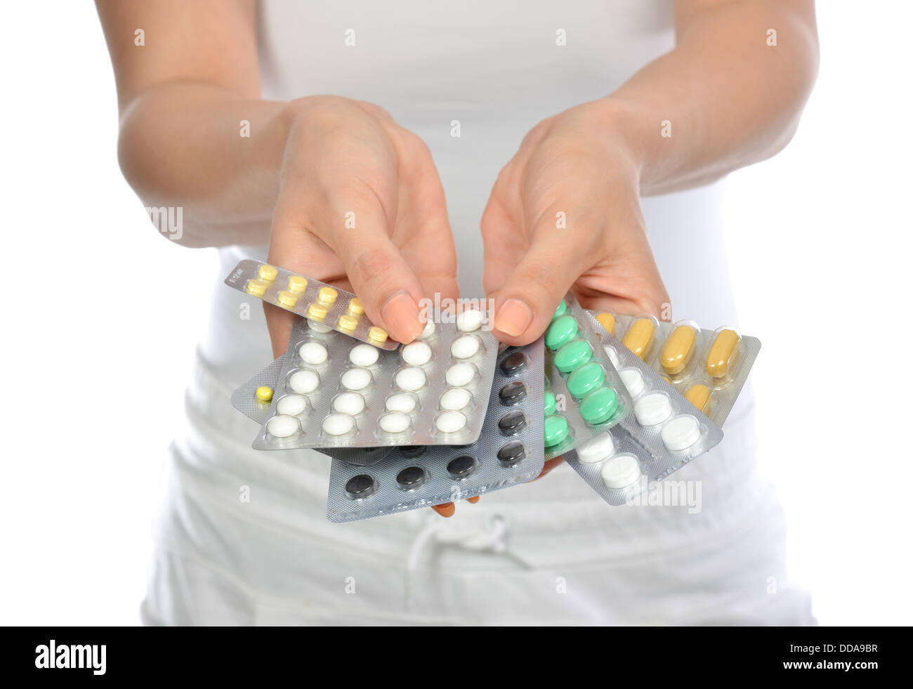 Hands holding packs of medicine aspirin painkiller tablet pills ...