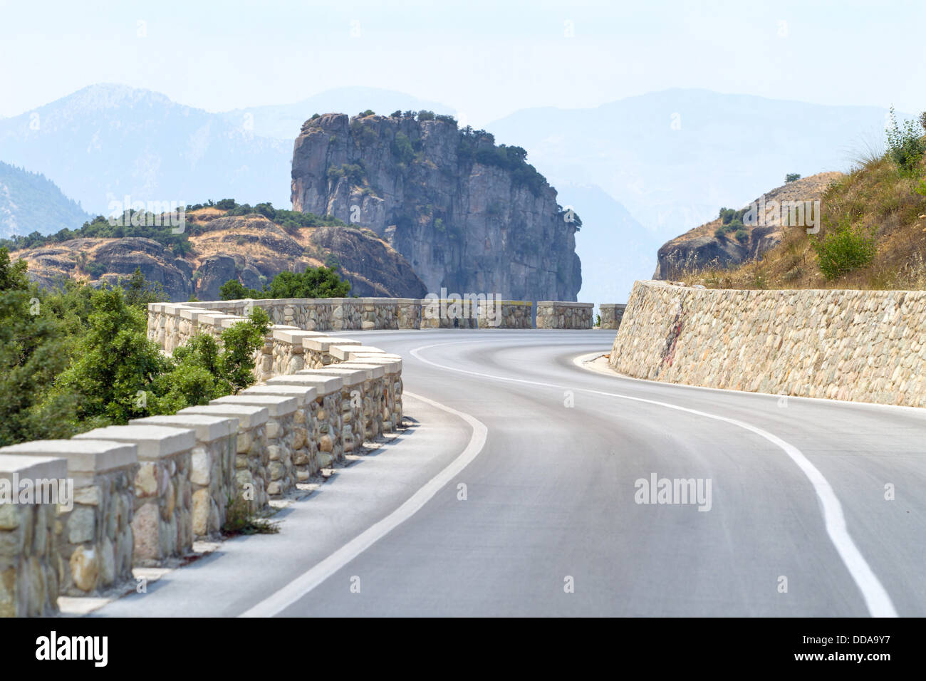 Mountain road curve in Meteora, Greece Stock Photo - Alamy