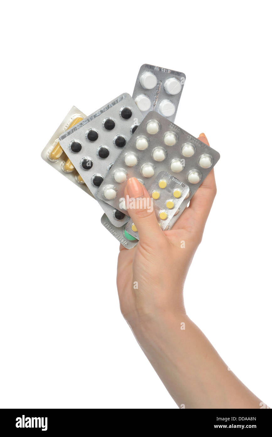 Hands holding packs of medicine aspirin painkiller tablet pills ...