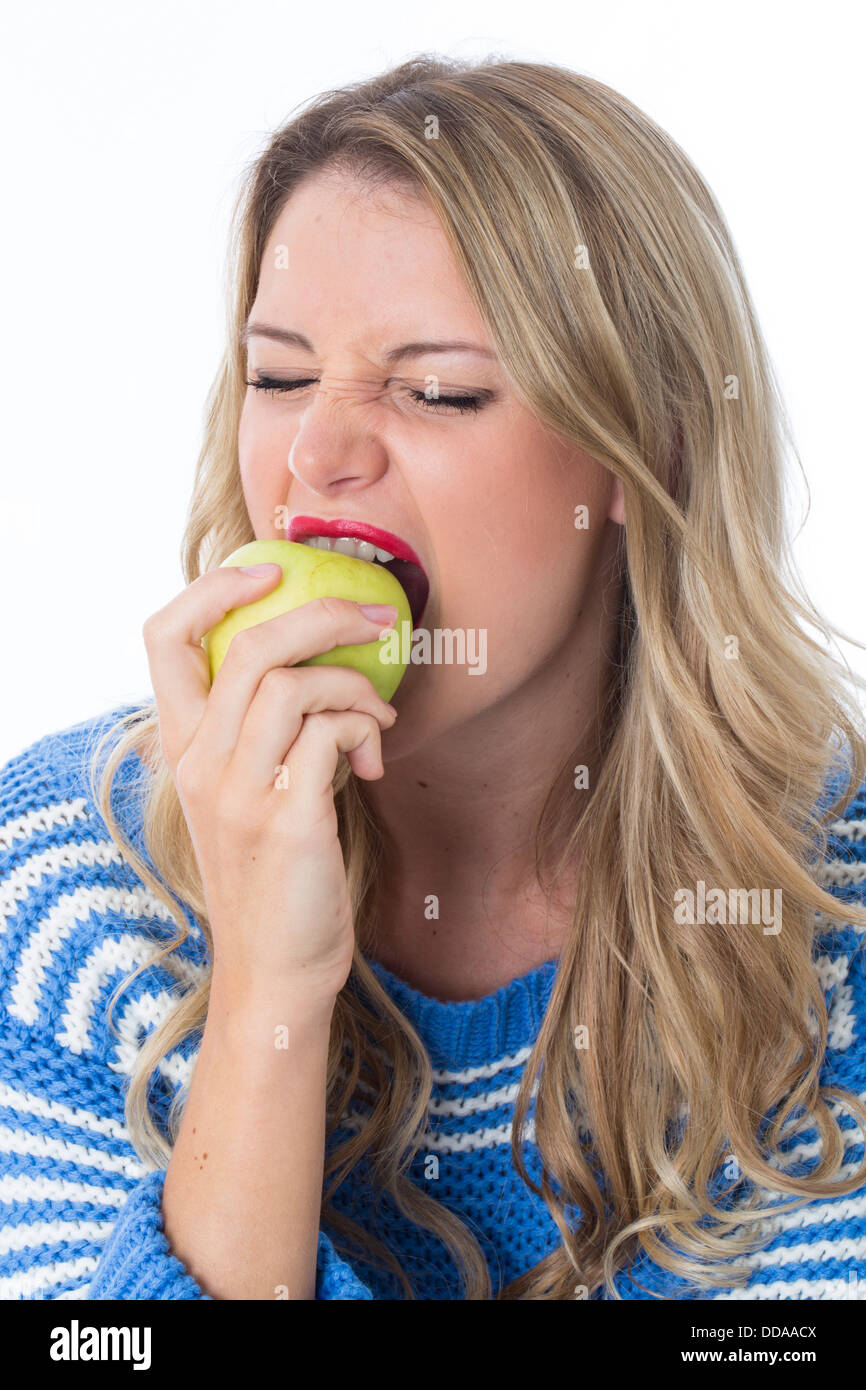 Model Released. Attractive Young Woman Holding an Apple Stock Photo - Alamy