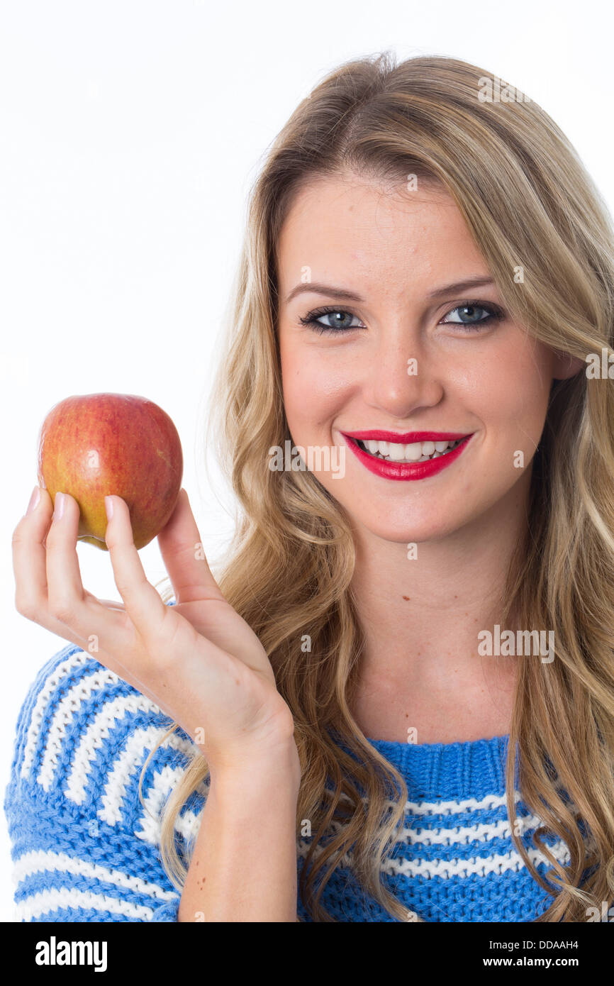Model Released. Attractive Young Woman Holding an Apple Stock Photo - Alamy