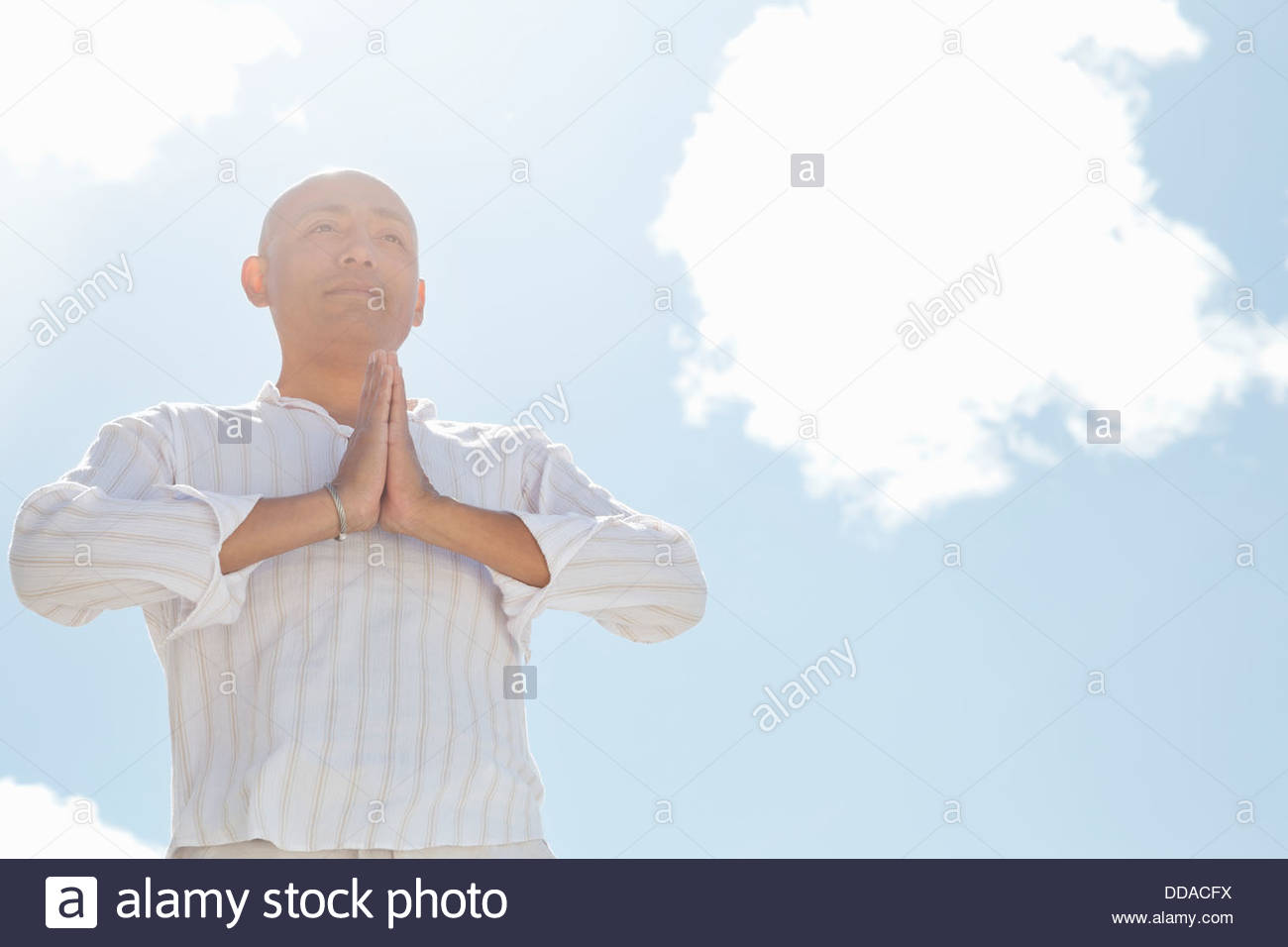 Hands in prayer position hi-res stock photography and images - Alamy
