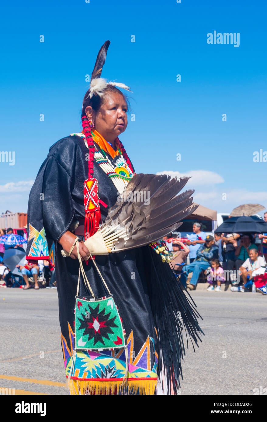 Native American with traditional costume participates at the 92 annual ...