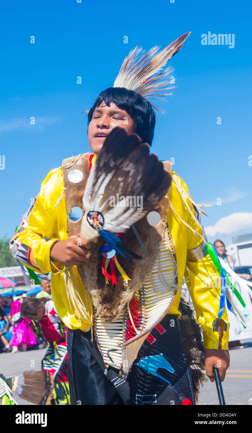 Native American with traditional costume participates at the 92 annual ...