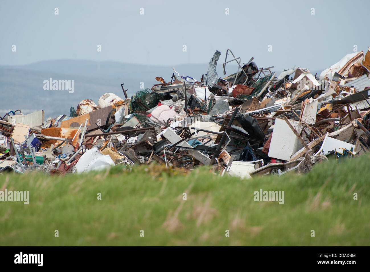 Junkyard with garbage piled high Stock Photo - Alamy