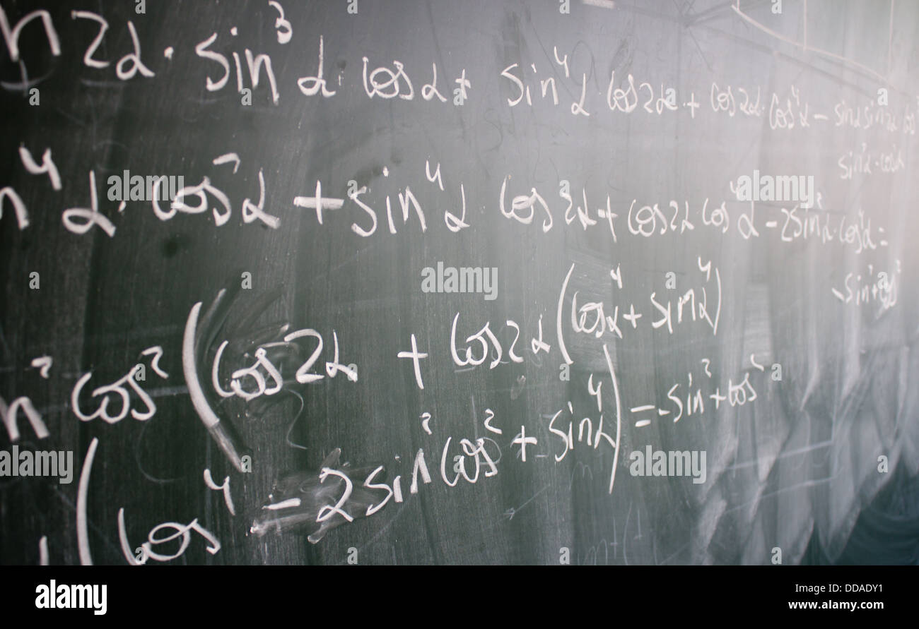 Blackboard with trigonometric formulas and numbers written on it Stock ...