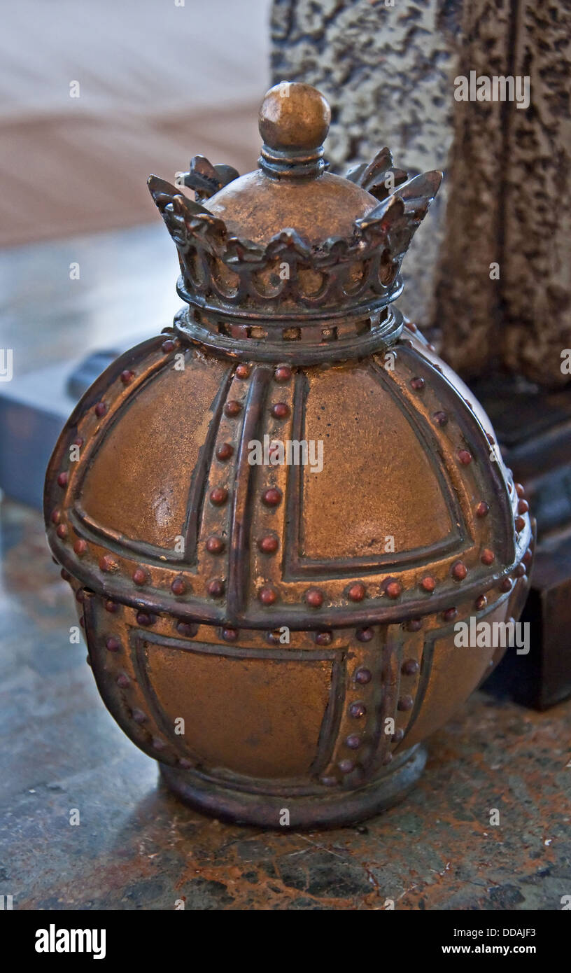 This home decor object is an antique metal small vase. It has many ...