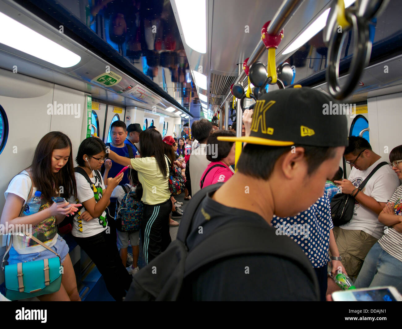 The Disneyland MTR line. Inside the MTR train which was specially ...