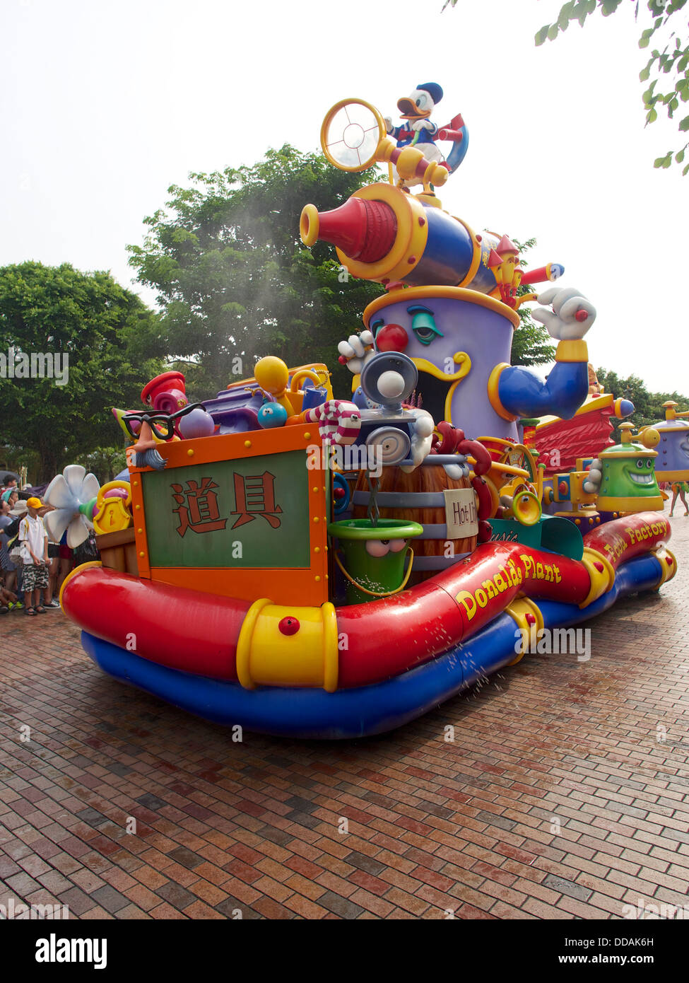 The water parade at Disneyland Hong Kong. Disney characters travel ...