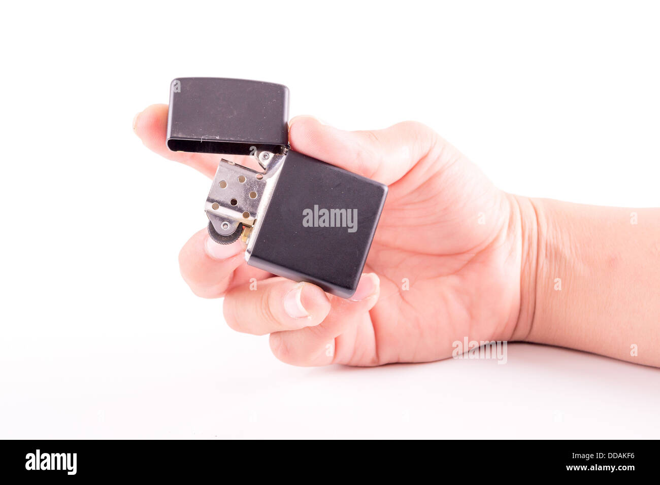 Hand hold holding lighter, on white background Stock Photo - Alamy