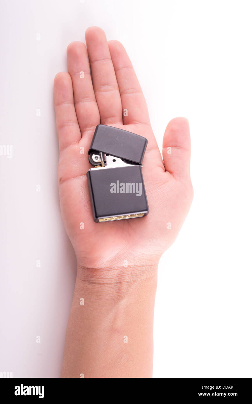 Hand hold holding lighter, on white background Stock Photo - Alamy
