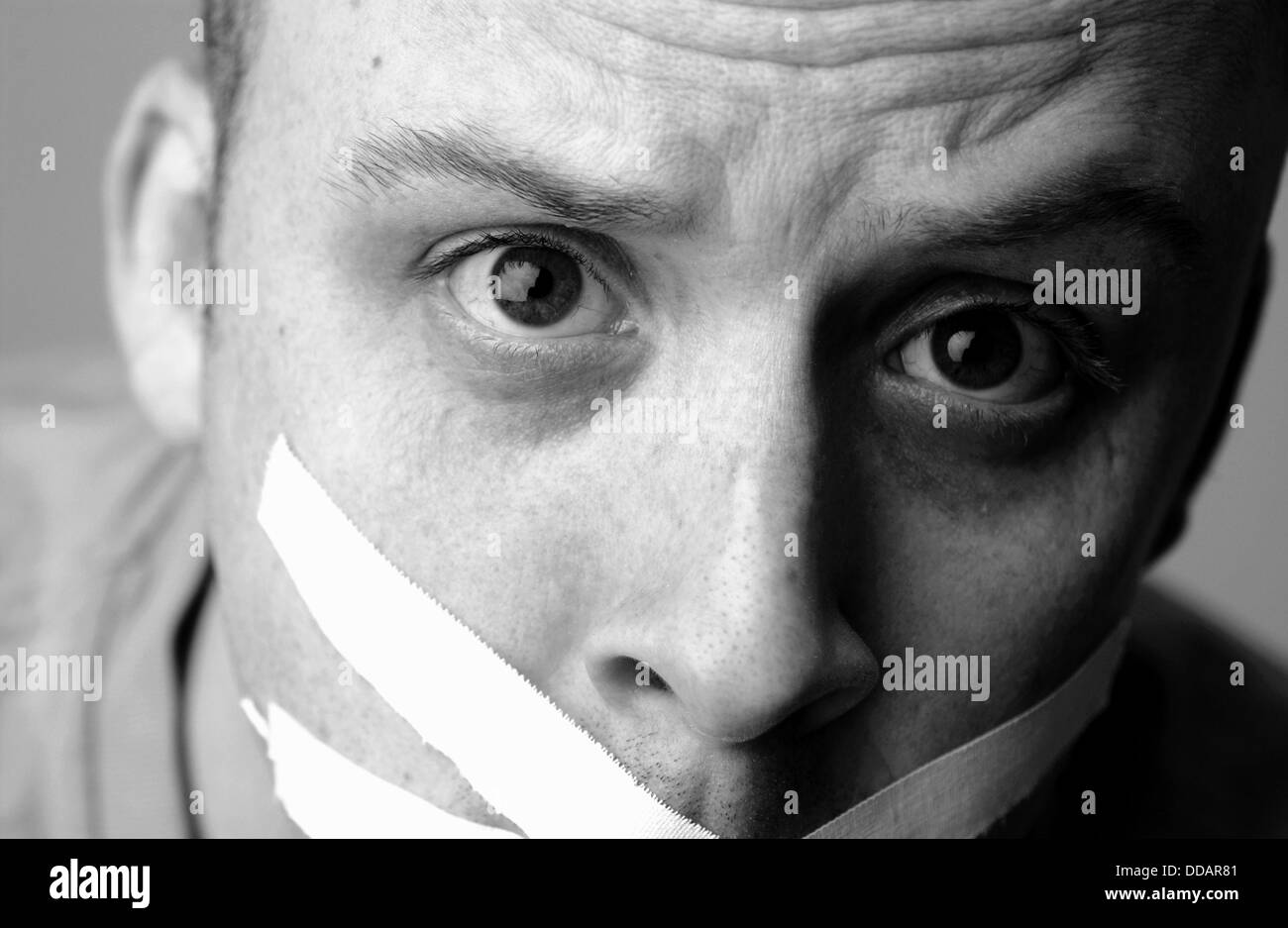 Tape mouth Black and White Stock Photos & Images - Alamy