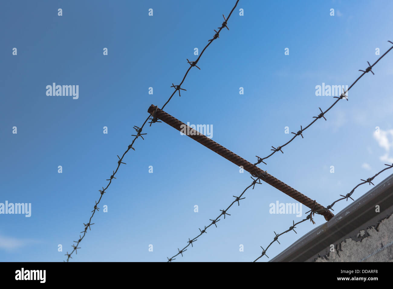 Barbed wire fence business hi-res stock photography and images - Alamy