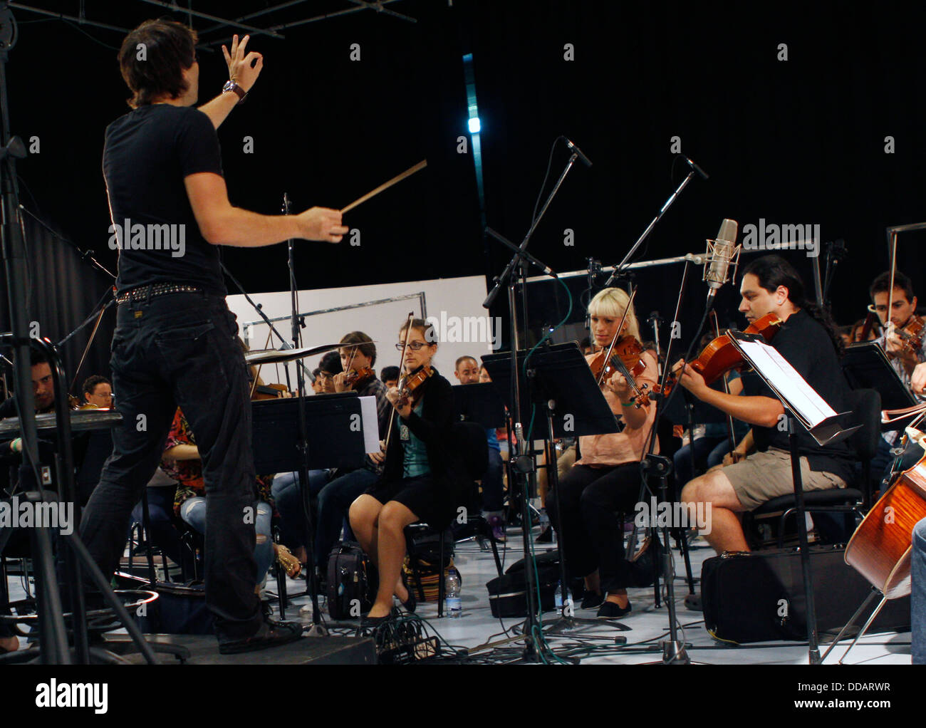 The world orchestra performs during the recording of a symphony in a ...