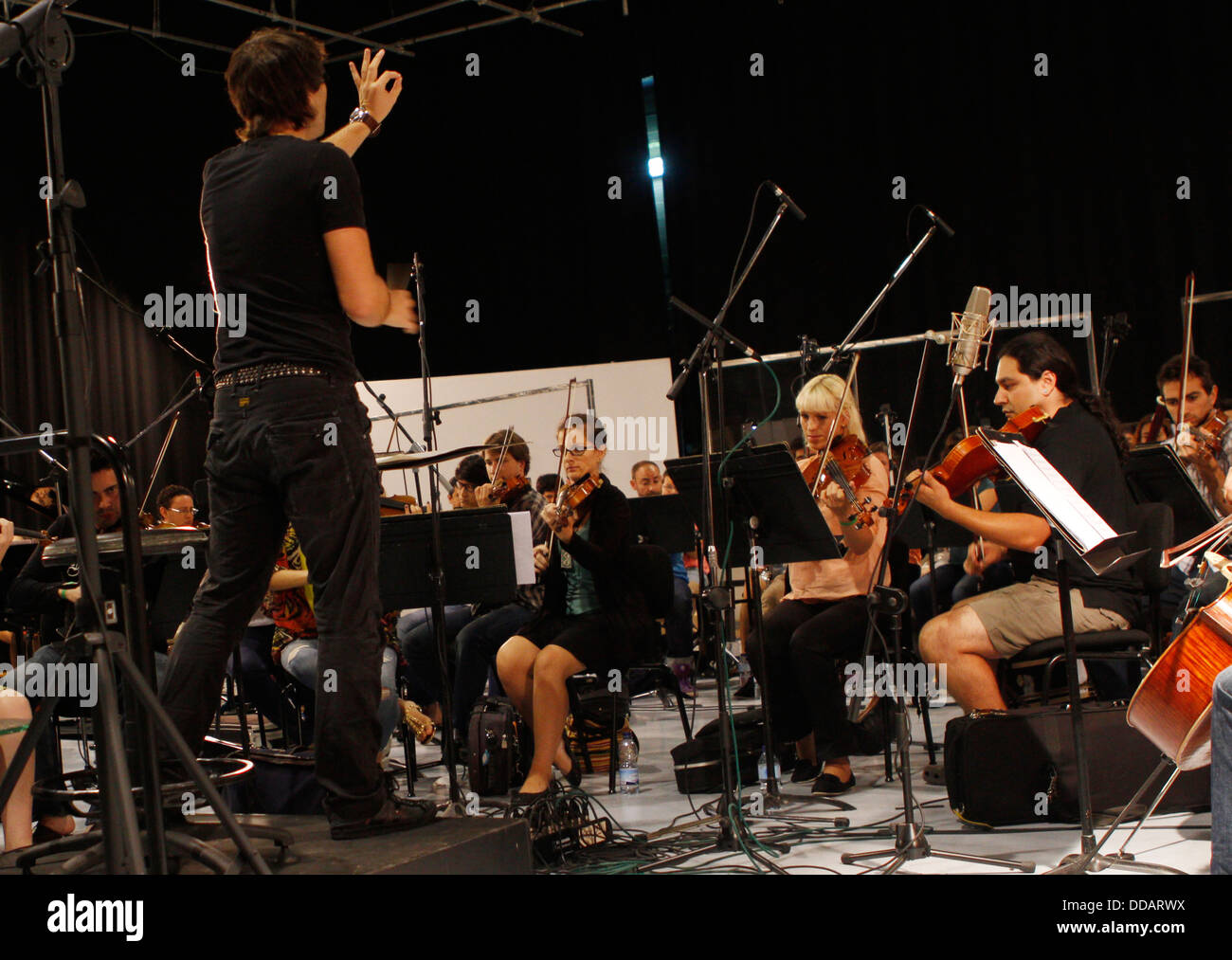 The world orchestra performs during the recording of a symphony in a ...